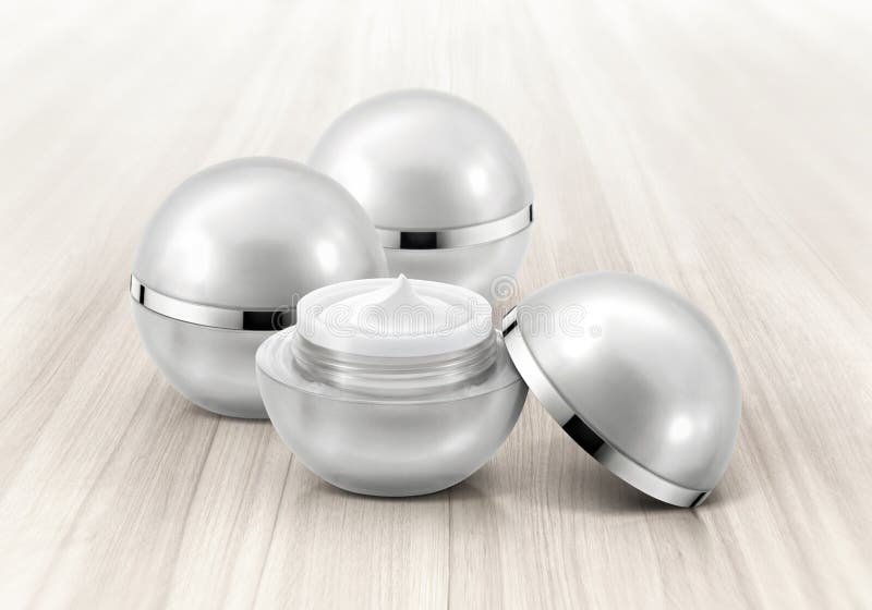 Silver Sphere Cosmetic Jar on Wood Stock Image - Image of lotion ...