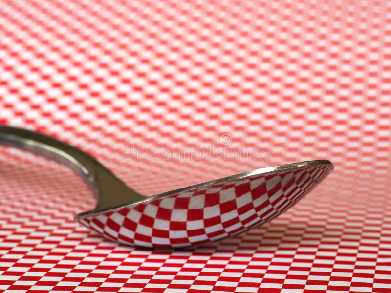 Spoon with Red and White Checkers Reflected Stock Image - Image of ...
