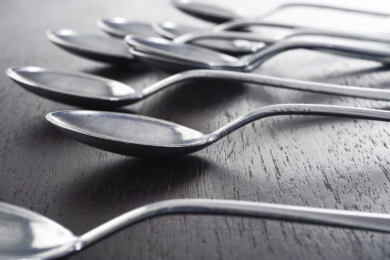Silver spoon on table stock image. Image of arranging - 46668405