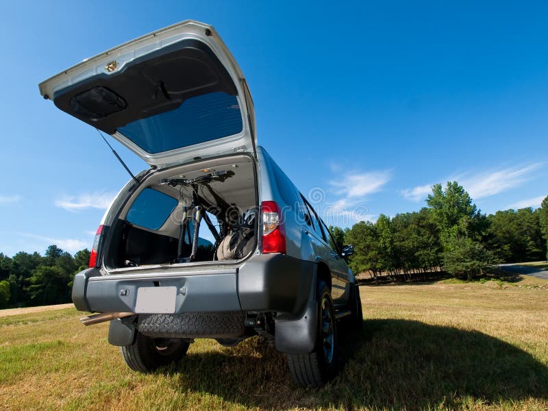 Silver Sports Utility Vehicle Hatch Open Stock Image - Image of grass ...