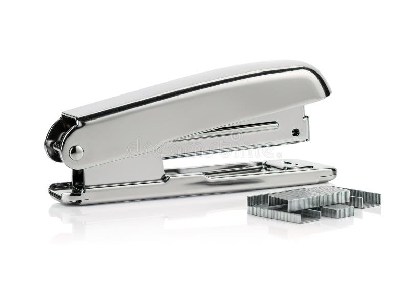 A Silver Stapler with a Silver Paper Clip and a Stack of Paper Clips Ai ...