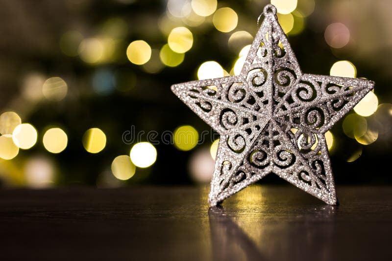 Silver Star Christmas Tree Decoration with Christmas Tree Lights Stock ...