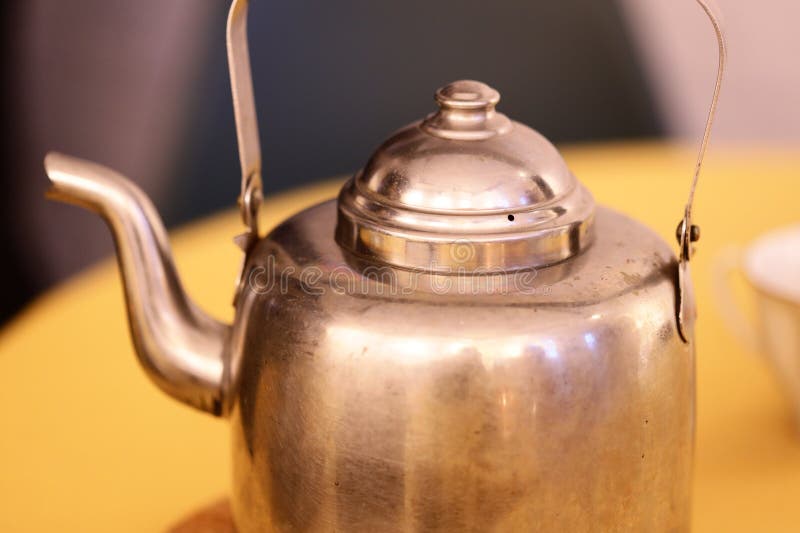 A Silver Tea Pot Sits on Top of a Table, Ready for Use Stock Image ...