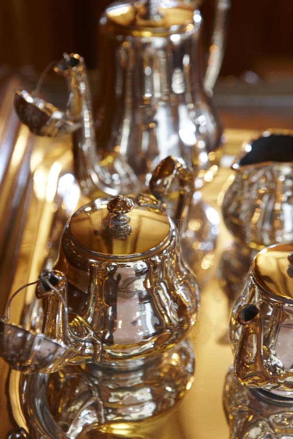 Silver Tea Set with Golden Reflection in a Train Wagon Stock Photo ...