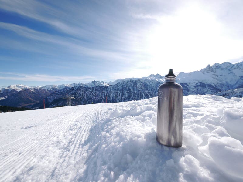 Silver thermos flask slope stock image. Image of mountains - 66376963