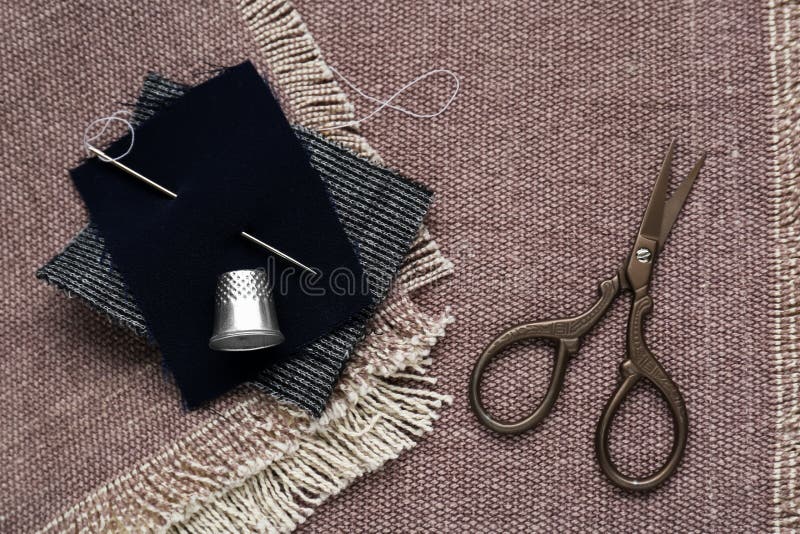 Thimble and Needle with Sewing Thread Isolated on White Stock Image ...