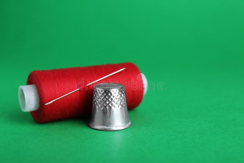 Thimble and Needle with Sewing Thread Isolated on White Stock Image ...