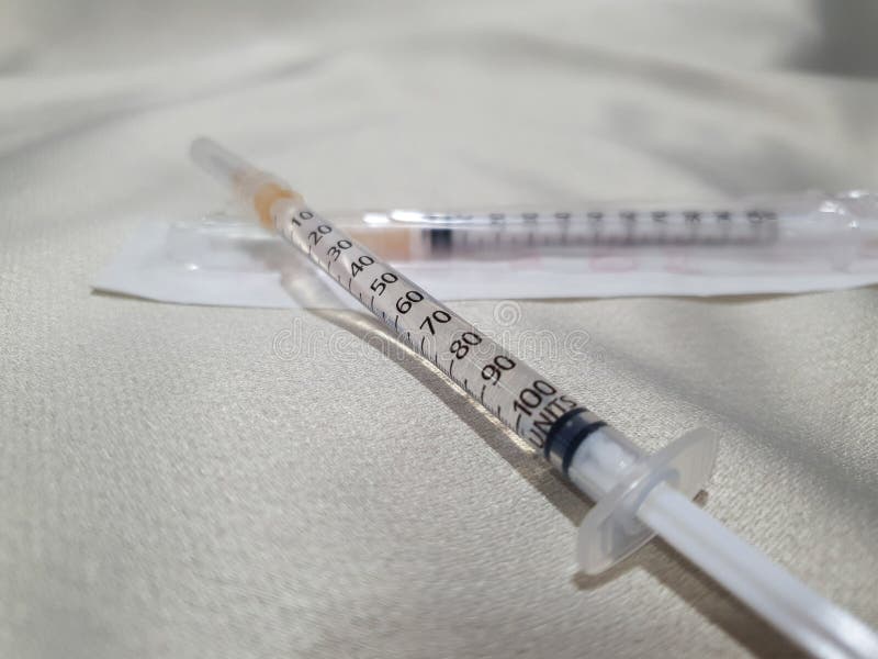 A Silver, Thin Syringe for Hospital Use Stock Photo - Image of hospital ...