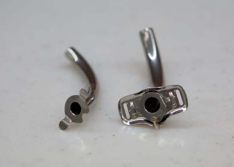 Silver tracheostomy tube stock photo. Image of trachea - 64172486