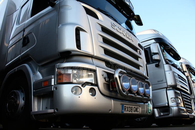 Silver Trucks, tree silver parked trucks from Stage Truck company ...