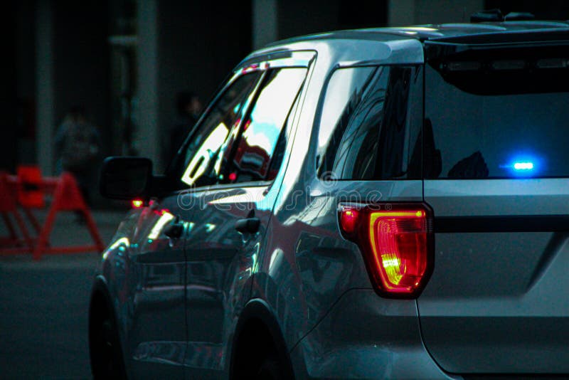 Unmarked Police Car with Switched on Blue Light Stock Photo - Image of ...
