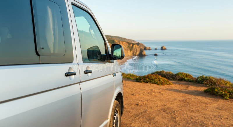 Silver Van Overlooking Coastal Cliff with Ocean View at Sunset Stock ...