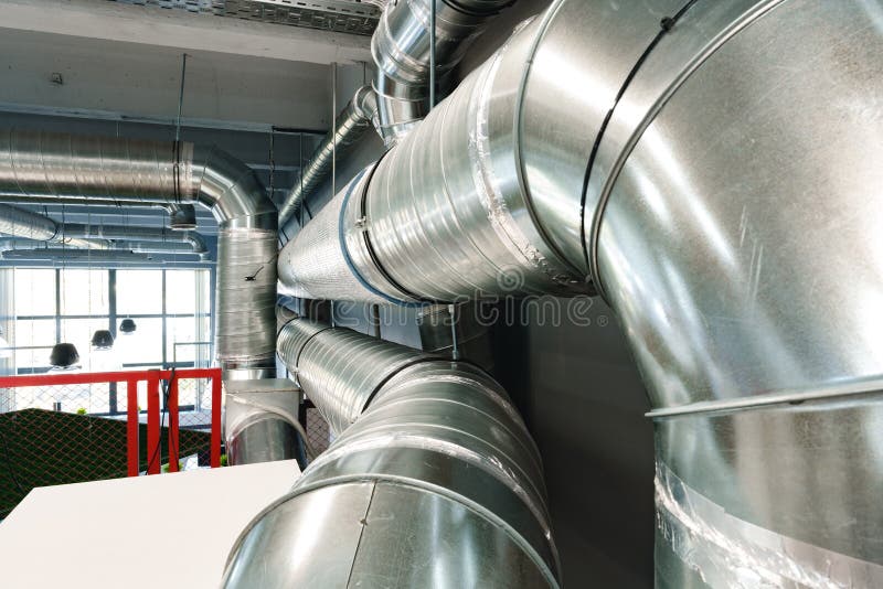 Silver Ventilation Pipes Hanging from the Ceiling Inside the Building ...