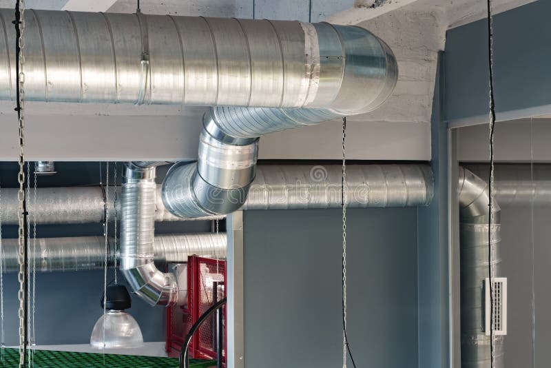 Silver Ventilation Pipes Hanging from the Ceiling Inside the Building ...