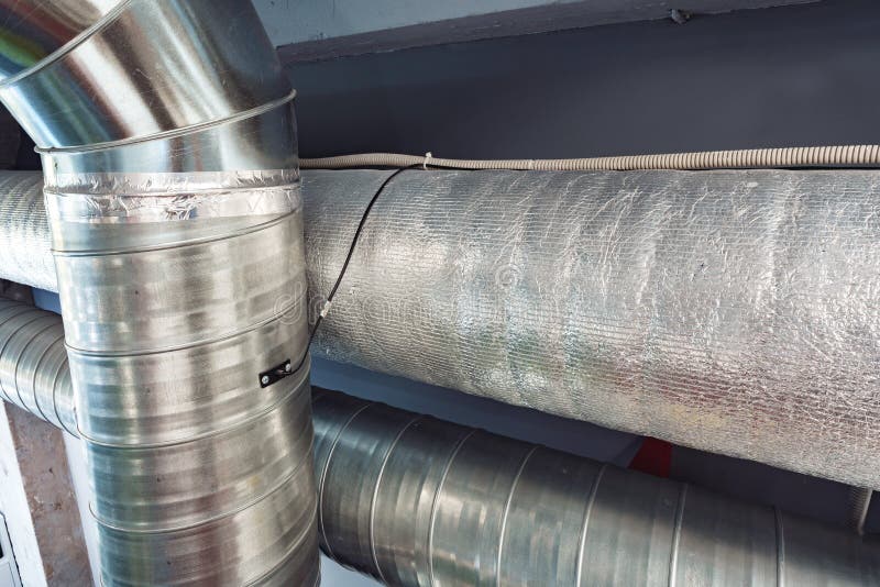 Silver Ventilation Pipes Hanging from the Ceiling Inside the Building ...