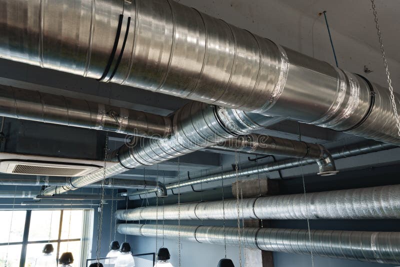 Silver Ventilation Pipes Hanging from the Ceiling Inside the Building ...