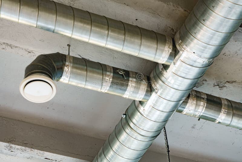 Silver Ventilation Pipes Hanging from the Ceiling Inside the Building ...