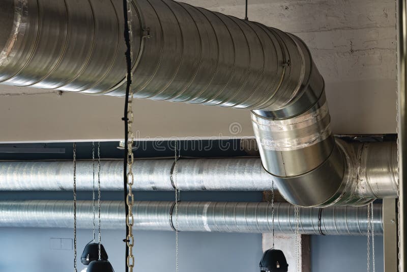 Silver Ventilation Pipes Hanging from the Ceiling Inside the Building ...