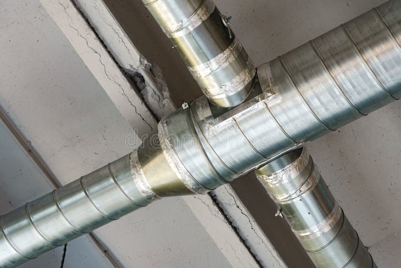 Silver Ventilation Pipes Hanging from the Ceiling Inside the Building ...