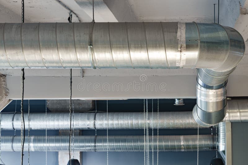 Silver Ventilation Pipes Hanging from the Ceiling Inside the Building ...