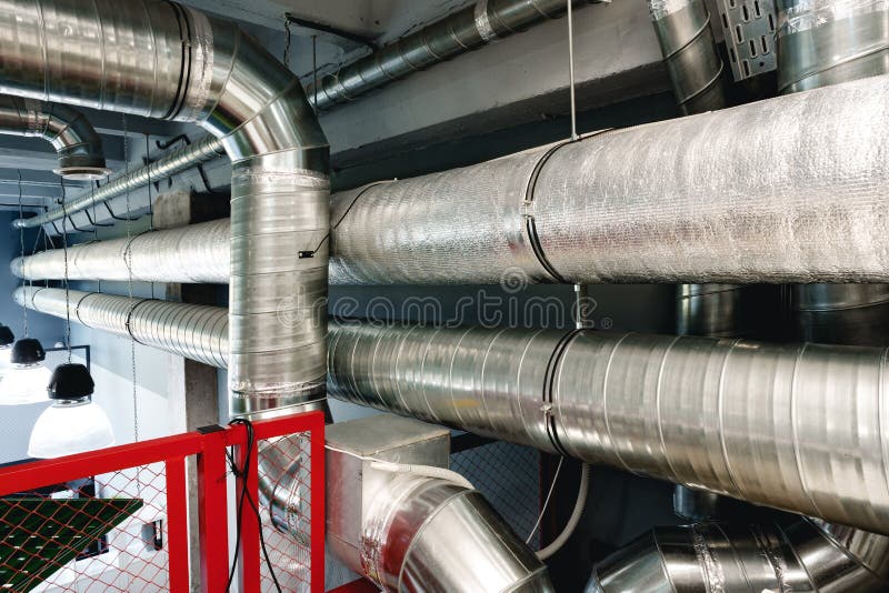 Silver Ventilation Pipes Hanging from the Ceiling Inside the Building ...