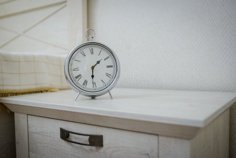 Silver Vintage Clock on the Nightstand Stock Image - Image of ...