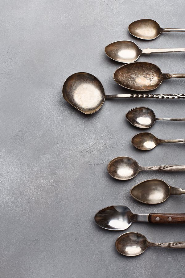 Silver Vintage Spoons on Gray Concrete Background Stock Image - Image ...