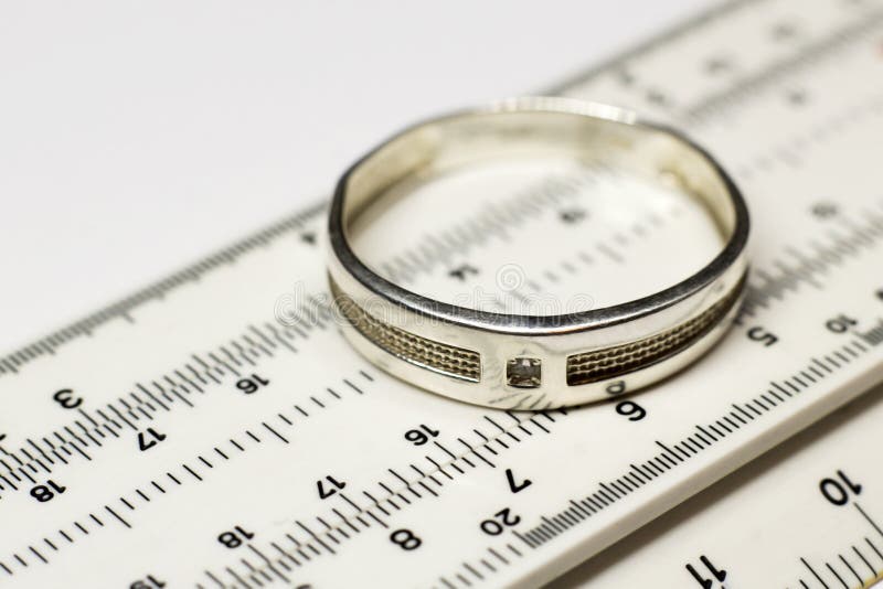 Silver Wedding Ring on Measuring Instrument, Pawnshop Stock Image ...