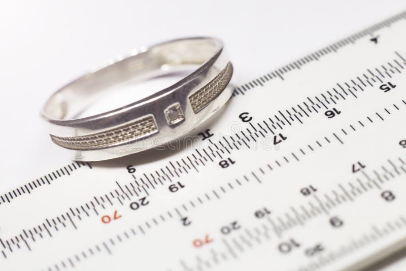 Silver Wedding Ring on Measuring Instrument, Pawnshop Stock Image ...