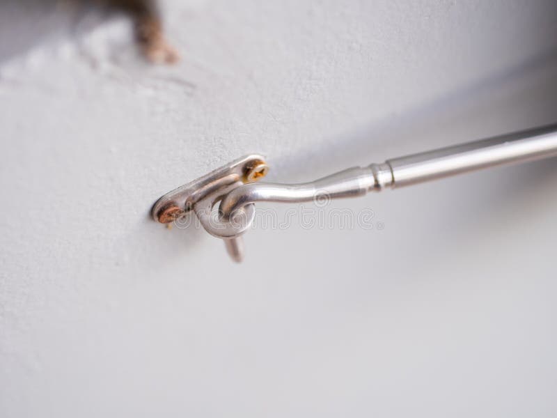 Silver Window or Door Hook Latch on White Wall Stock Photo - Image of ...