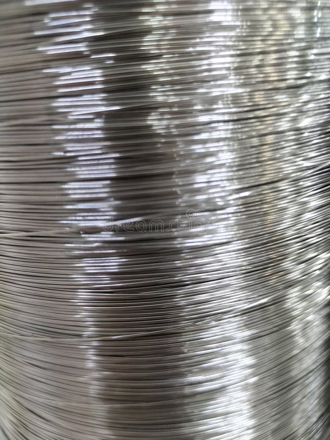 Silver wires in roll stock photo. Image of white, silver - 267655168
