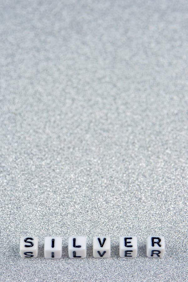 Silver Word Formed by White Dices with Black Letters Laying on Silver ...