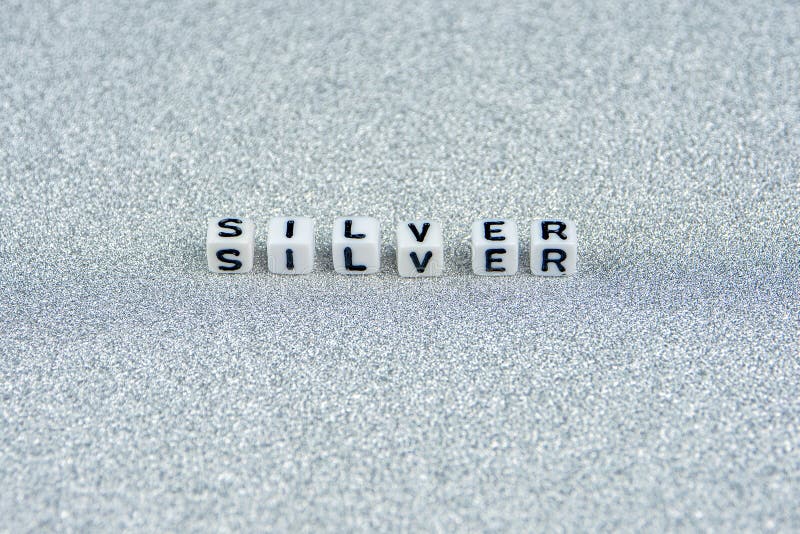 Silver Word Formed by White Dices with Black Letters Laying on Silver ...