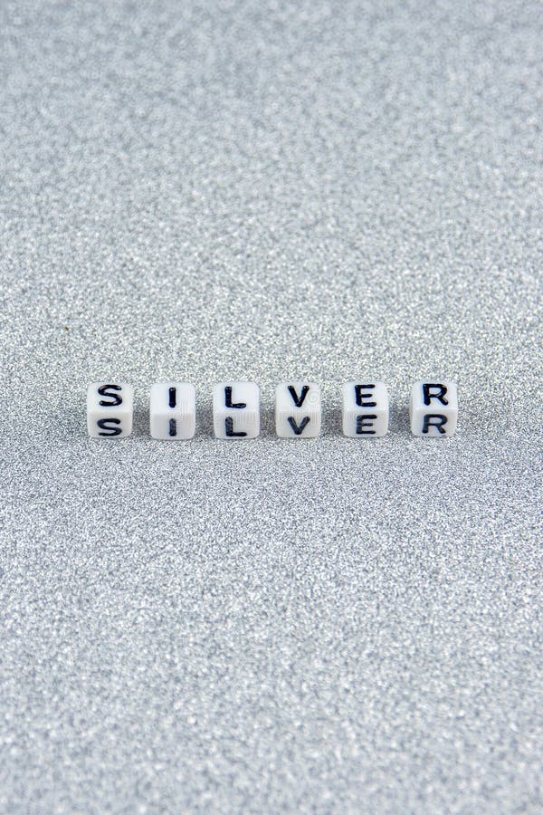 Silver Word Formed by White Dices with Black Letters Laying on Silver ...