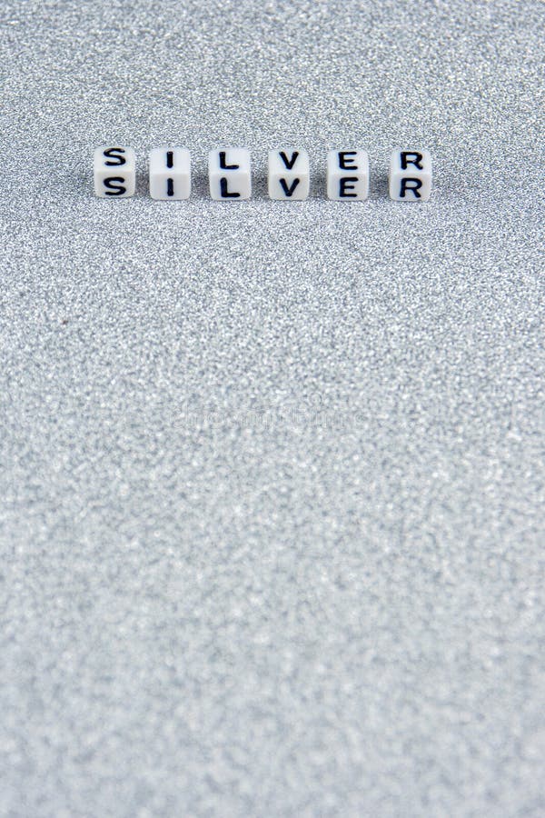 Silver Word Formed by White Dices with Black Letters Laying on Silver ...