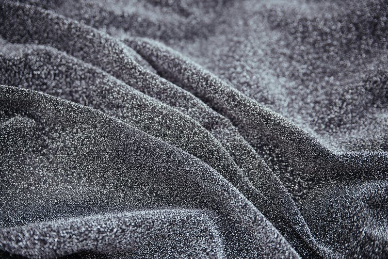 Silver Wrinkled Fabric Sand with Sequins. Gray Material Rolled Up with ...