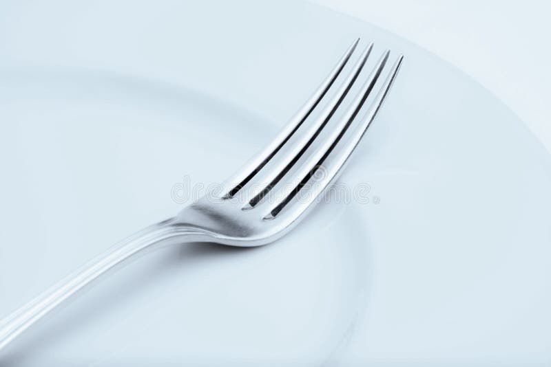 Silverware - Closeup of a Fork Stock Image - Image of metal, porcelain ...