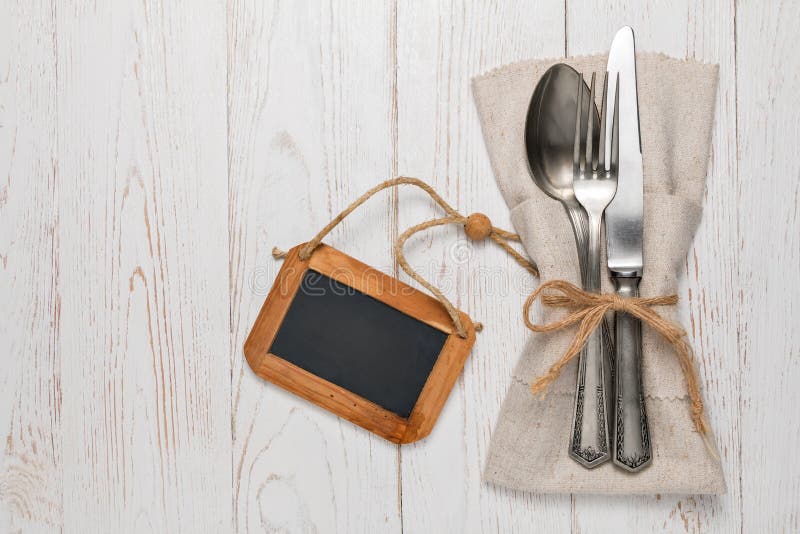 Silverware with an Empty Tag on a Table Stock Image - Image of dish ...