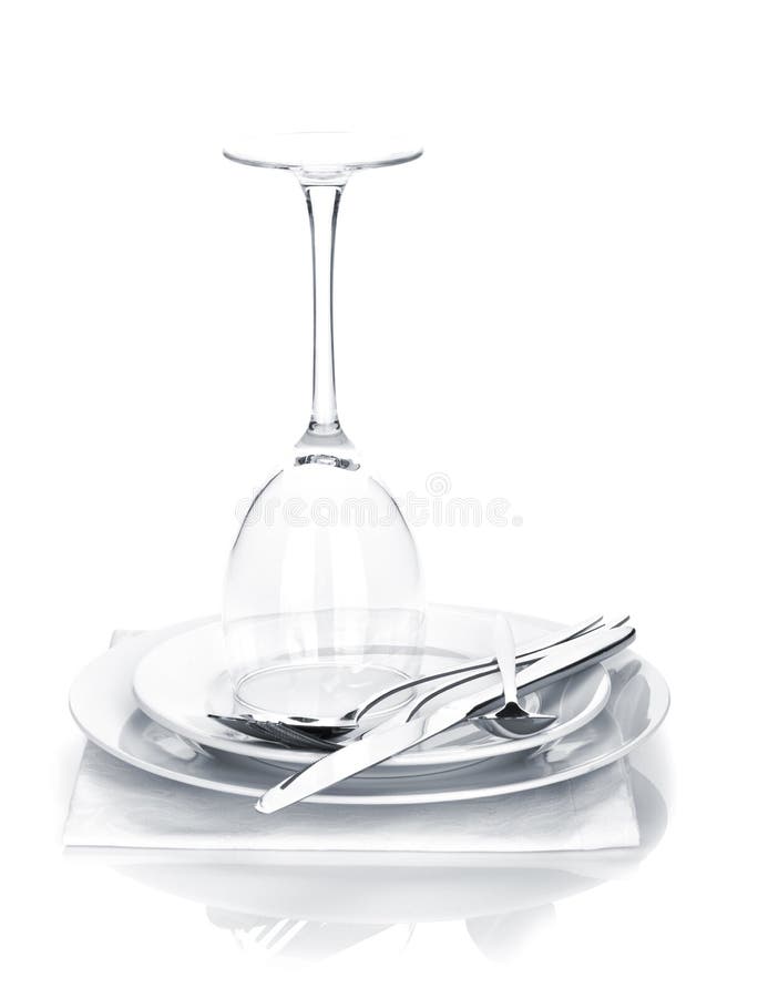 Silverware or Flatware Set and Wine Glass Over Plates Stock Photo ...