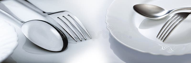 Silverware: Fork, Knife, Spoon, Plate on White Table Stock Image ...