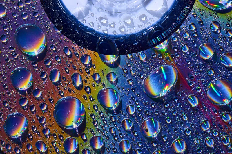 Silvery Water Drops on Abstract CD Surface with Rainbow Colors ...