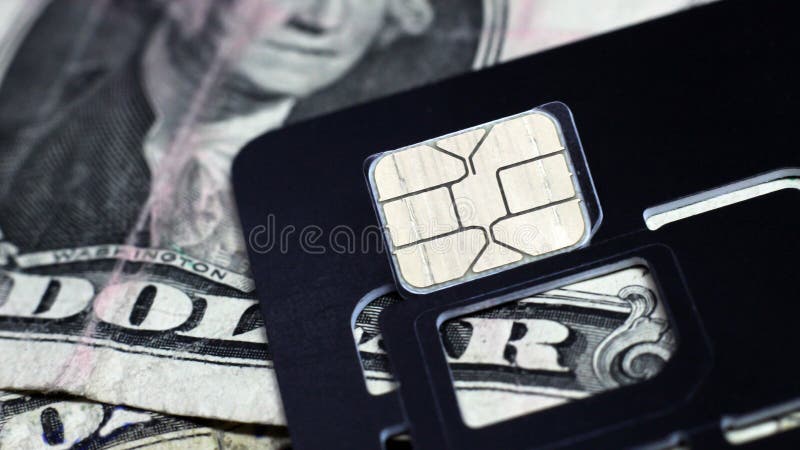 SIM Card for Cellular Phones on Dollar Bill Stock Image - Image of ...
