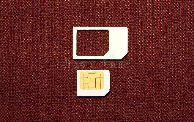 SIM card micro on brown stock photo. Image of internet - 44566682