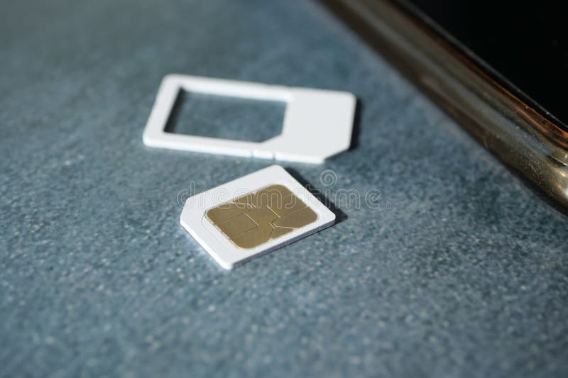 A Sim Card for a Smart Phone on Table Stock Image - Image of device ...