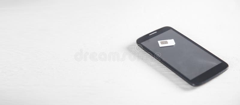Sim Card with Smartphone on White Desk. Space for Your Text Stock Photo ...