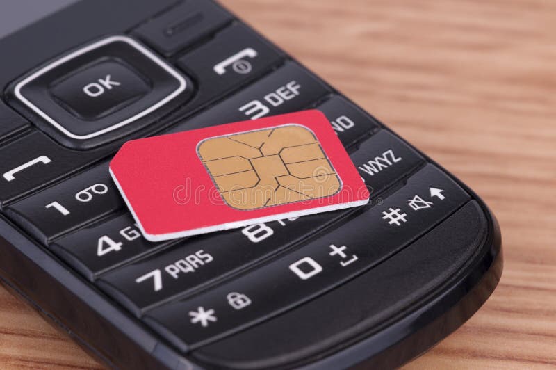 SIM Card sobre o telefone imagem de stock. Imagem de internet - 44250955