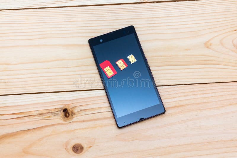 SIM Cards of Different Form Factor on the Smartphone Stock Photo ...