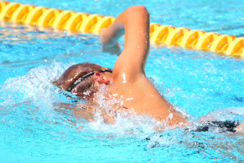 Simning arkivfoto. Bild av athenen, färgstänk, baddräkt - 7620940