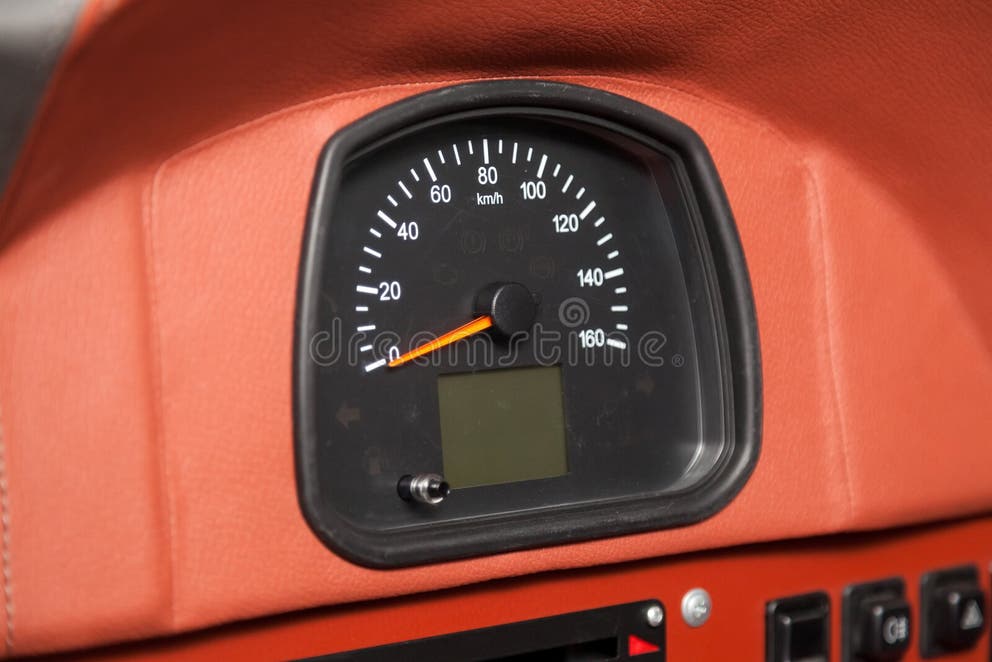 Analog Car Speedometer with a Red Arrow on a Leather Trimmed Panel ...