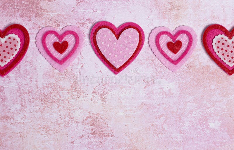 Simple Background with Felt Love Hearts on Pink Background Stock Photo ...